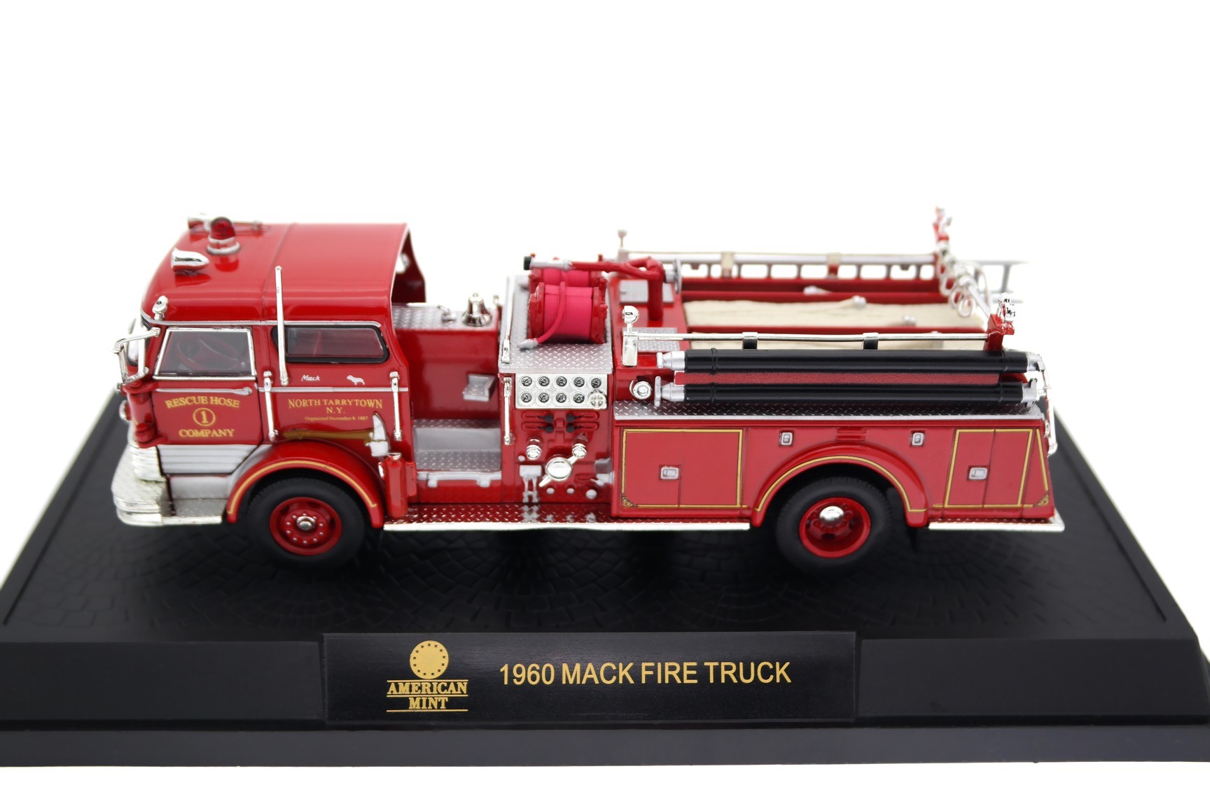 A collectible scale model Mack Serie C Fire Truck from Signature Models