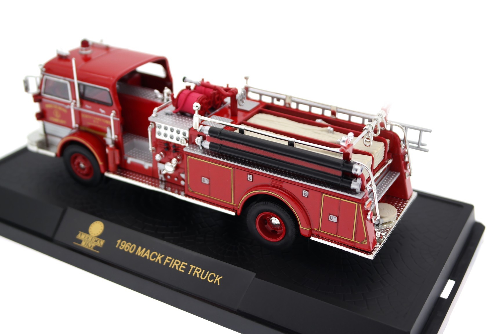 A collectible scale model Mack Serie C Fire Truck from Signature Models