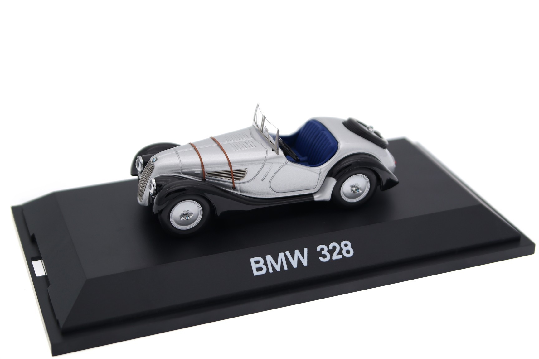 A collectible scale model BMW 328 from Schuco