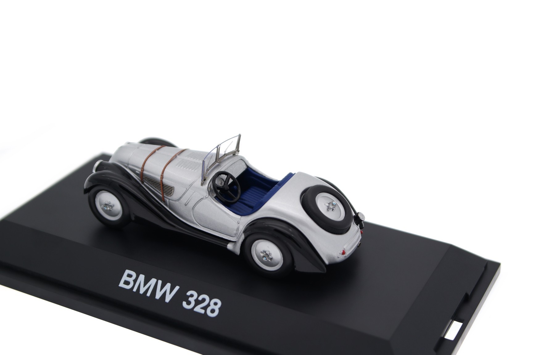 A collectible scale model BMW 328 from Schuco