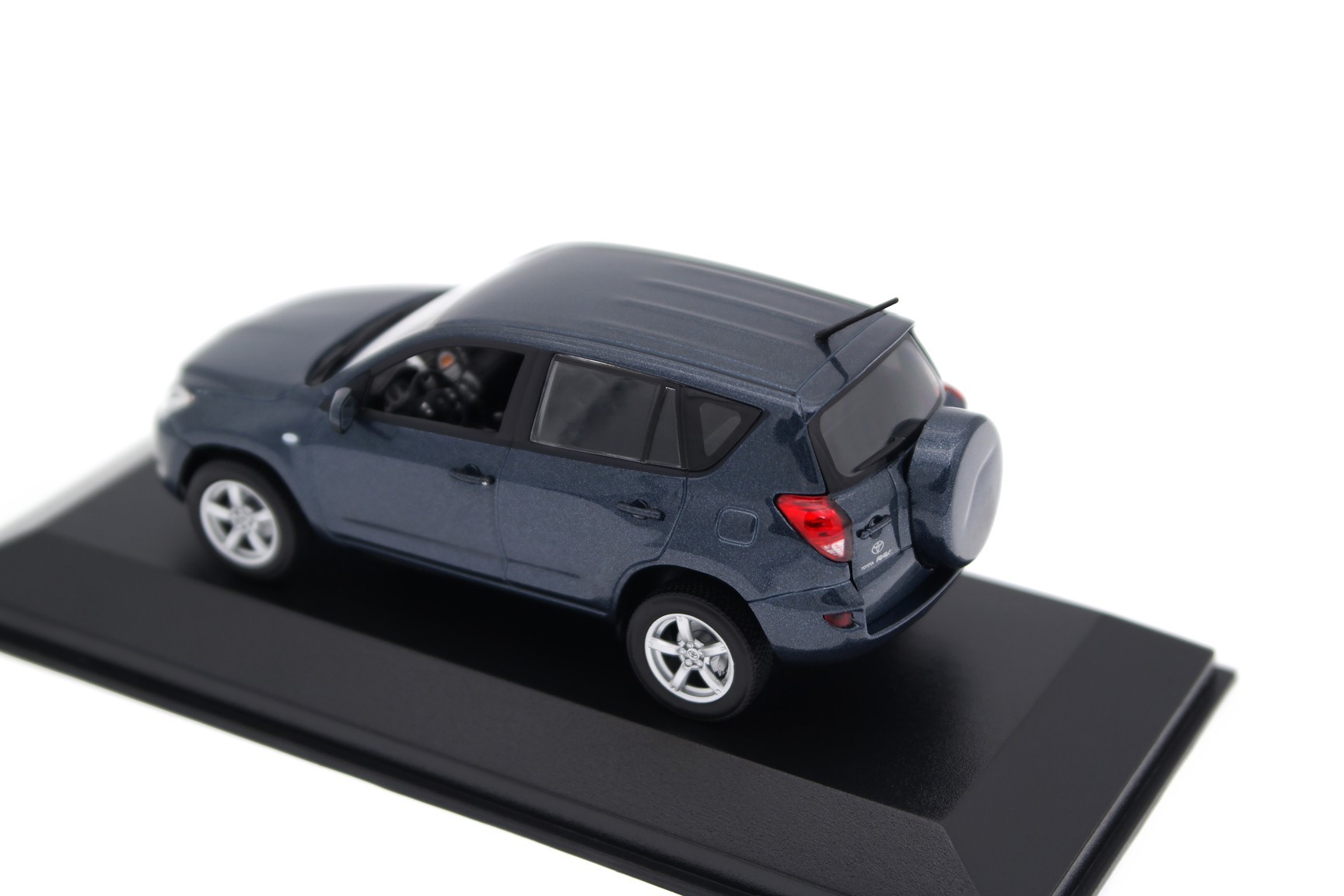 A collectible scale model Toyota RAV4 from Minichamps