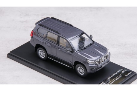 A collectible scale model Toyota Land Cruiser Prado from Vitesse